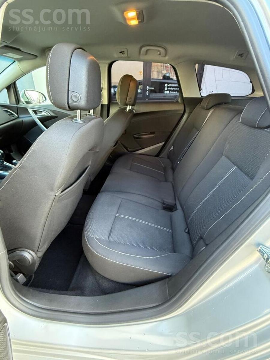 Grey Opel Astra 2014 in Riga, with an engine capacity of 1.60 L and mileage of 262 thousand km for 3600 €, photo 15 on AUTOMOTO.COM.LV