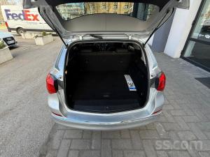 Grey Opel Astra 2014 in Riga, with an engine capacity of 1.60 L and mileage of 262 thousand km for 3600 €, photo 16 on AUTOMOTO.COM.LV