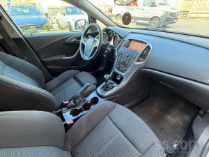 Grey Opel Astra 2014 in Riga, with an engine capacity of 1.60 L and mileage of 262 thousand km for 3600 €, photo 20 on AUTOMOTO.COM.LV