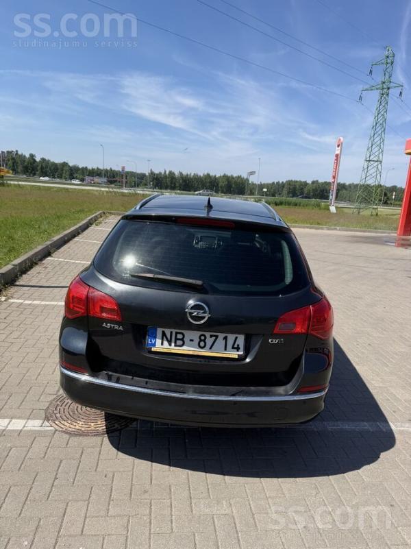Pelēks Opel Astra 2014 Rīga, ar dzinēja tilpumu 1.60 L un nobraukumu 304 tūkst. km par 2150 €, foto 4 vietnē AUTOMOTO.COM.LV