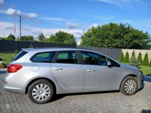 Grey Opel Astra 2014 in Kaunas, with an engine capacity of 1.69 L and mileage of 228 thousand km for 2949 €, photo 8 on AUTOMOTO.COM.LV