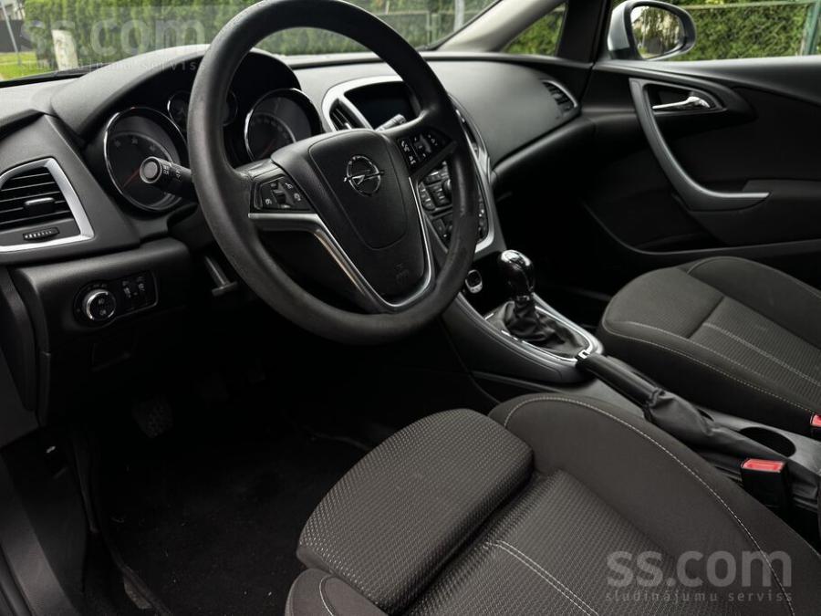Grey Opel Astra 2014 in Riga, with an engine capacity of 1.60 L and mileage of 262 thousand km for 3400 €, photo 13 on AUTOMOTO.COM.LV