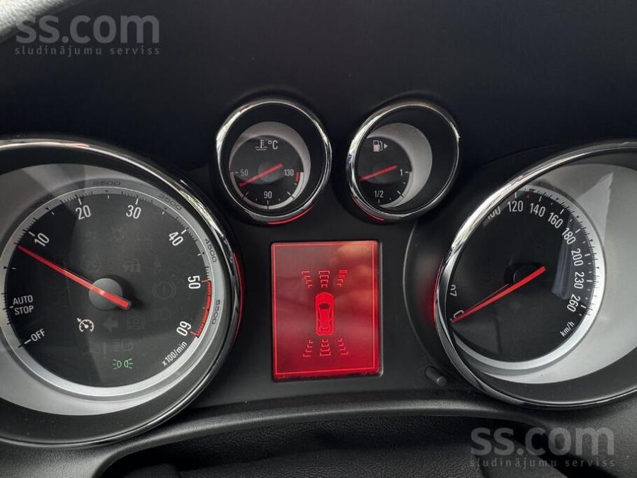 Grey Opel Astra 2014 in Riga, with an engine capacity of 1.60 L and mileage of 262 thousand km for 3400 €, photo 15 on AUTOMOTO.COM.LV