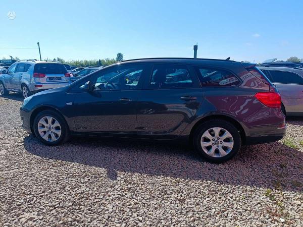 Grey Opel Astra 2014 in Kretinga, with an engine capacity of 1.60 L and mileage of 257 thousand km for 4250 €, photo 7 on AUTOMOTO.COM.LV