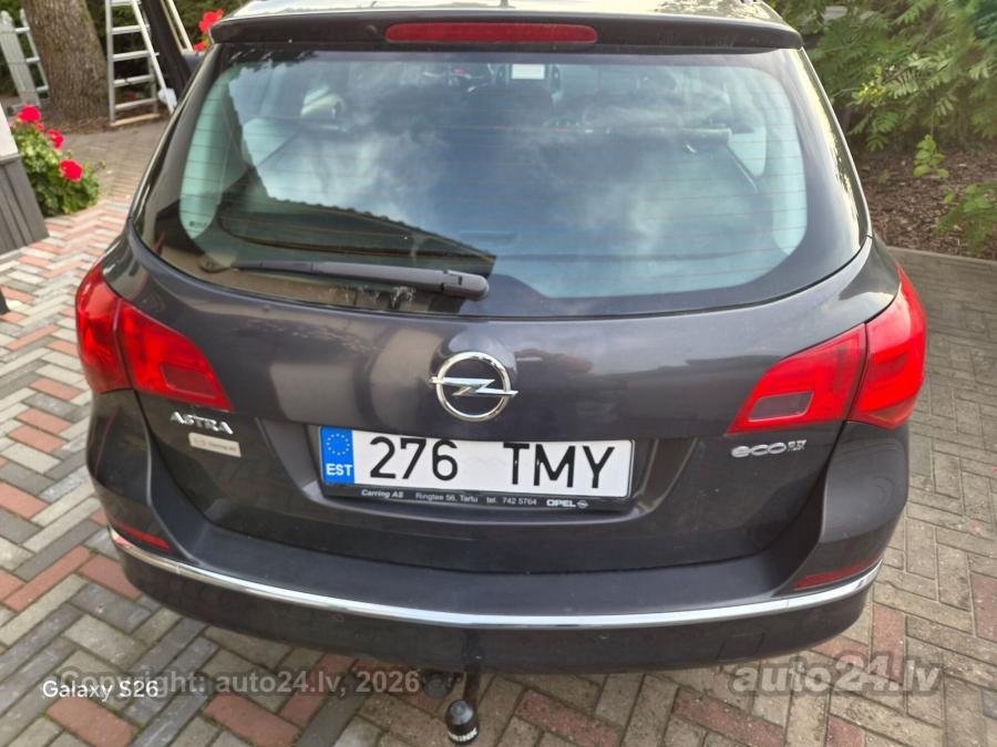 Grey Opel Astra 2014 in Tartu, with an engine capacity of 1.60 L and mileage of 268 thousand km for 4999 €, photo 4 on AUTOMOTO.COM.LV