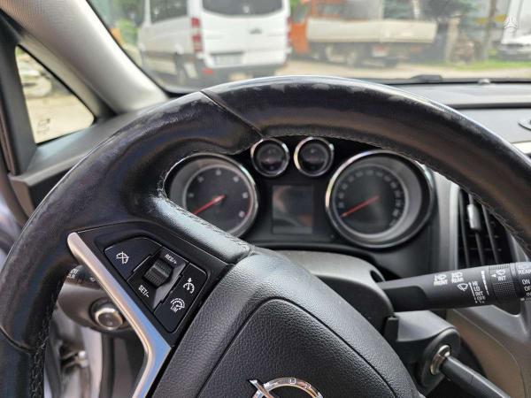 Pelēks Opel Astra 2014 Kauņa, ar dzinēja tilpumu 1.96 L un nobraukumu 289 tūkst. km par 5250 €, foto 6 vietnē AUTOMOTO.COM.LV