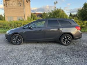 Grey Opel Astra 2014 in Riga, with an engine capacity of 1.70 L and mileage of 313 thousand km for 3300 €, photo 7 on AUTOMOTO.COM.LV