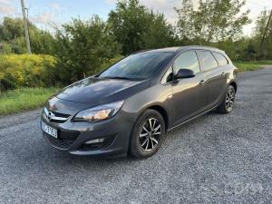 Grey Opel Astra 2014 in Riga, with an engine capacity of 1.70 L and mileage of 313 thousand km for 3300 €, photo 8 on AUTOMOTO.COM.LV