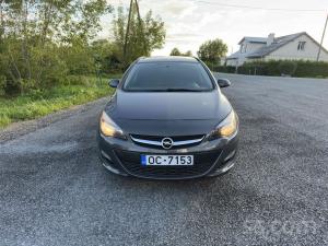 Grey Opel Astra 2014 in Riga, with an engine capacity of 1.70 L and mileage of 313 thousand km for 3300 €, photo 9 on AUTOMOTO.COM.LV
