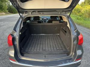 Grey Opel Astra 2014 in Riga, with an engine capacity of 1.70 L and mileage of 313 thousand km for 3300 €, photo 11 on AUTOMOTO.COM.LV