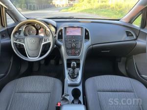 Grey Opel Astra 2014 in Riga, with an engine capacity of 1.70 L and mileage of 313 thousand km for 3300 €, photo 16 on AUTOMOTO.COM.LV