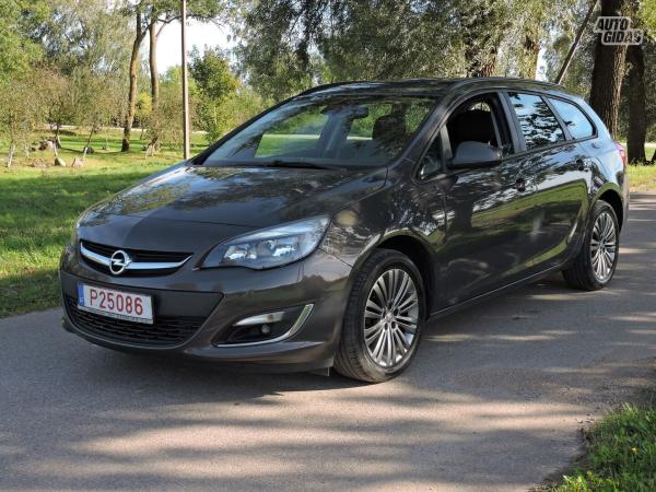 Grey Opel Astra 2014 in Marijampole, with an engine capacity of 1.40 L and mileage of 209 thousand km for 2950 €, photo 3 on AUTOMOTO.COM.LV