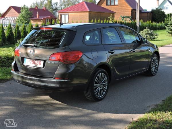 Grey Opel Astra 2014 in Marijampole, with an engine capacity of 1.40 L and mileage of 209 thousand km for 2950 €, photo 5 on AUTOMOTO.COM.LV