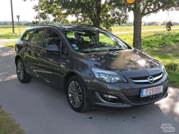 Grey Opel Astra 2014 in Marijampole, with an engine capacity of 1.40 L and mileage of 209 thousand km for 2950 €, photo 6 on AUTOMOTO.COM.LV