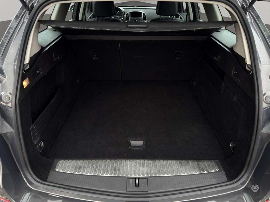 Grey Opel Astra 2014 in Kaunas, with an engine capacity of 1.40 L and mileage of 249 thousand km for 4499 €, photo 11 on AUTOMOTO.COM.LV
