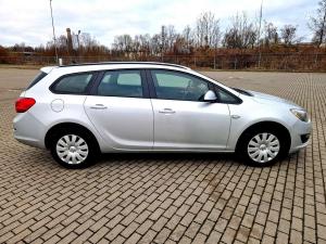 Grey Opel Astra 2015 in Marijampole, with an engine capacity of 1.60 L and mileage of 221 thousand km for 3650 €, photo 5 on AUTOMOTO.COM.LV
