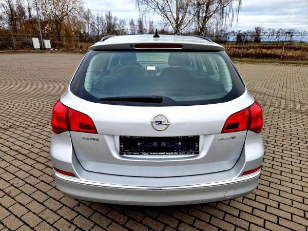 Grey Opel Astra 2015 in Marijampole, with an engine capacity of 1.60 L and mileage of 221 thousand km for 3650 €, photo 7 on AUTOMOTO.COM.LV