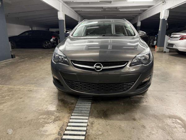 Grey Opel Astra 2015 in Kaunas, with an engine capacity of 1.60 L and mileage of 174 thousand km for 3800 €, photo 8 on AUTOMOTO.COM.LV