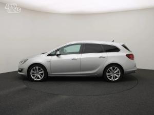 Grey Opel Astra 2015 in Vilnius, with an engine capacity of 1.40 L and mileage of 175 thousand km for 6499 €, photo 7 on AUTOMOTO.COM.LV