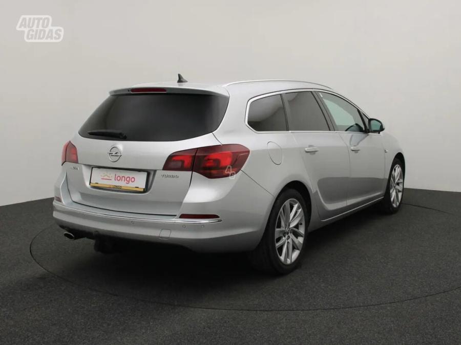 Grey Opel Astra 2015 in Vilnius, with an engine capacity of 1.40 L and mileage of 175 thousand km for 6499 €, photo 9 on AUTOMOTO.COM.LV