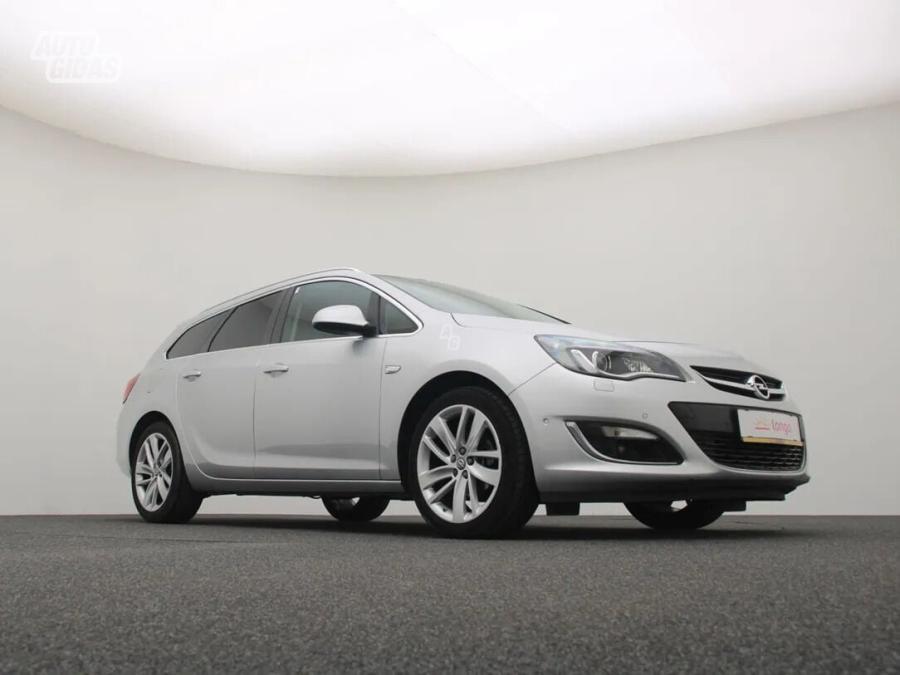 Grey Opel Astra 2015 in Vilnius, with an engine capacity of 1.40 L and mileage of 175 thousand km for 6499 €, photo 12 on AUTOMOTO.COM.LV
