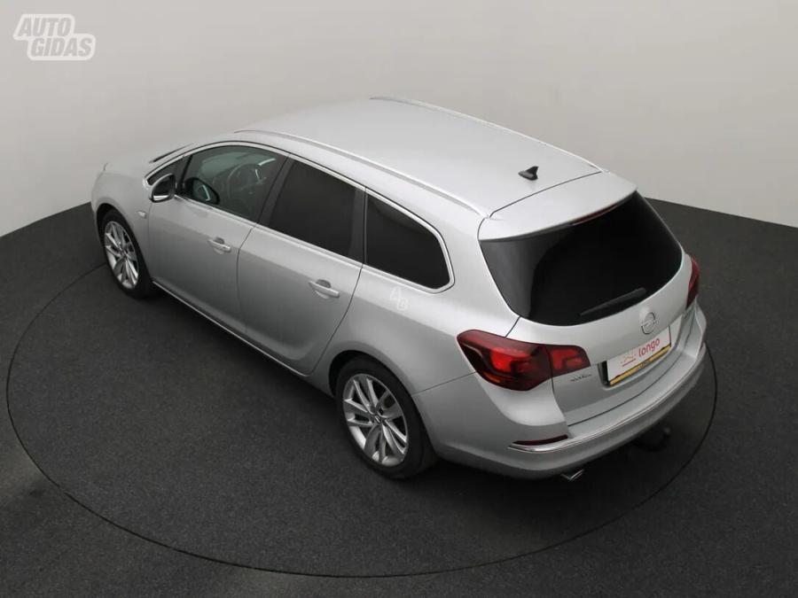Grey Opel Astra 2015 in Vilnius, with an engine capacity of 1.40 L and mileage of 175 thousand km for 6499 €, photo 13 on AUTOMOTO.COM.LV