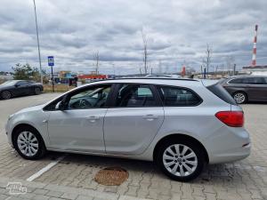 Grey Opel Astra 2015 in Vilnius, with an engine capacity of 1.60 L and mileage of 256 thousand km for 4999 €, photo 7 on AUTOMOTO.COM.LV