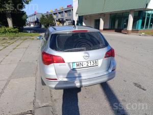 Grey Opel Astra 2015 in Riga, with an engine capacity of 1.60 L and mileage of 240 thousand km for 3300 €, photo 5 on AUTOMOTO.COM.LV