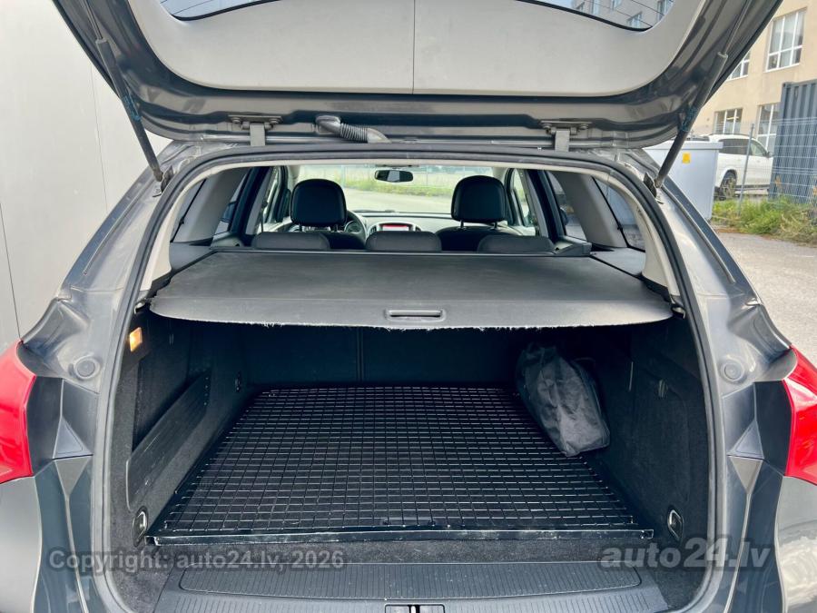 Grey Opel Astra 2015 in Tallinn, with an engine capacity of 1.70 L and mileage of 190 thousand km for 4490 €, photo 22 on AUTOMOTO.COM.LV