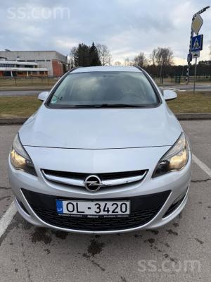 Grey Opel Astra 2015 in Riga, with an engine capacity of 1.60 L and mileage of 289 thousand km for 3900 €, photo  on AUTOMOTO.COM.LV