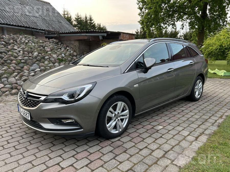 Grey Opel Astra 2016 in Liepaja, with an engine capacity of 1.60 L and mileage of 229 thousand km for 3450 €, photo 1 on AUTOMOTO.COM.LV