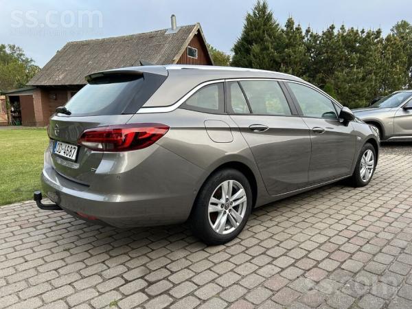 Grey Opel Astra 2016 in Liepaja, with an engine capacity of 1.60 L and mileage of 229 thousand km for 3450 €, photo 3 on AUTOMOTO.COM.LV