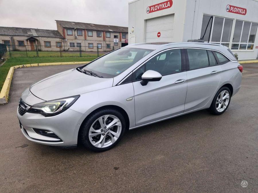 Grey Opel Astra 2016 in Kretinga, with an engine capacity of 1.60 L and mileage of 291 thousand km for 6450 €, photo 1 on AUTOMOTO.COM.LV