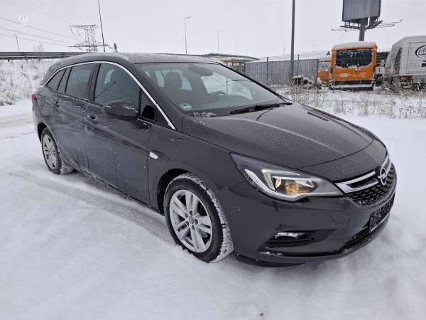 Grey Opel Astra 2016 in Marijampole, with an engine capacity of 1.60 L and mileage of 141 thousand km for 5900 €, photo 2 on AUTOMOTO.COM.LV