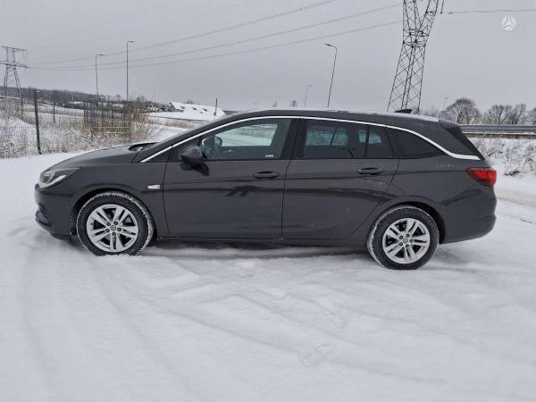 Grey Opel Astra 2016 in Marijampole, with an engine capacity of 1.60 L and mileage of 141 thousand km for 5900 €, photo 5 on AUTOMOTO.COM.LV