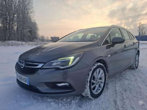 Grey Opel Astra 2016 in Kaunas, with an engine capacity of 1.60 L and mileage of 263 thousand km for 6250 €, photo 1 on AUTOMOTO.COM.LV