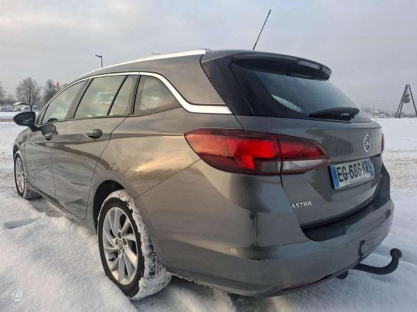 Grey Opel Astra 2016 in Kaunas, with an engine capacity of 1.60 L and mileage of 263 thousand km for 6250 €, photo 3 on AUTOMOTO.COM.LV
