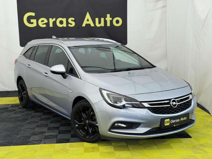 Grey Opel Astra 2016 in Vilnius, with an engine capacity of 1.60 L and mileage of 28 thousand km for 11290 €, photo 3 on AUTOMOTO.COM.LV