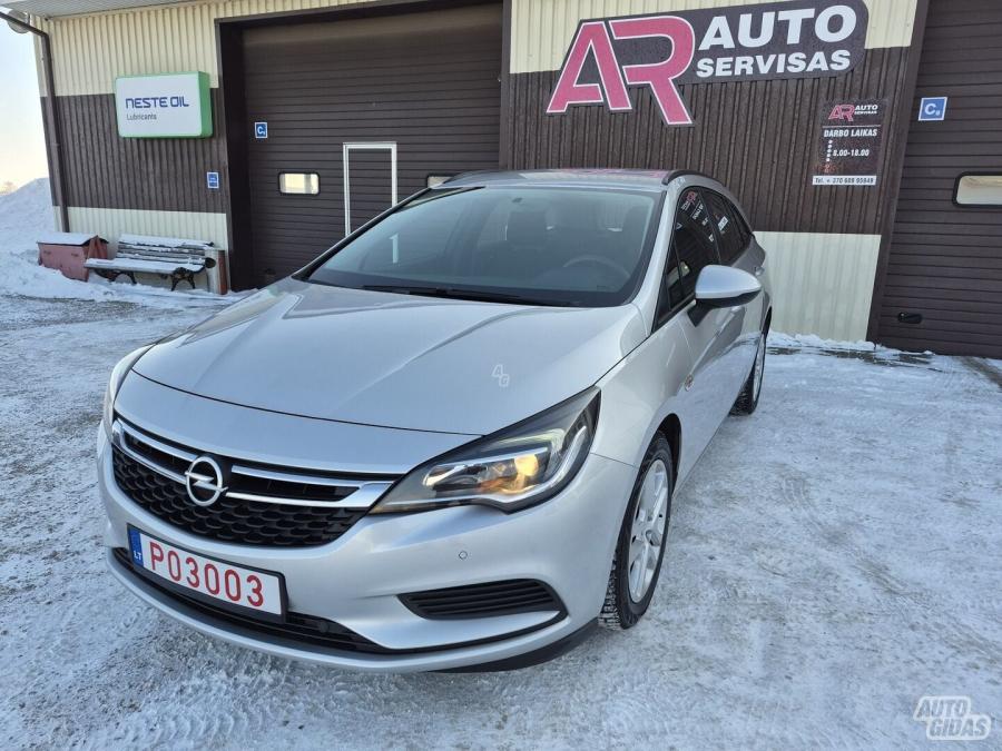 Grey Opel Astra 2016 in Vilnius, with an engine capacity of 1.60 L and mileage of 219 thousand km for 5950 €, photo 1 on AUTOMOTO.COM.LV
