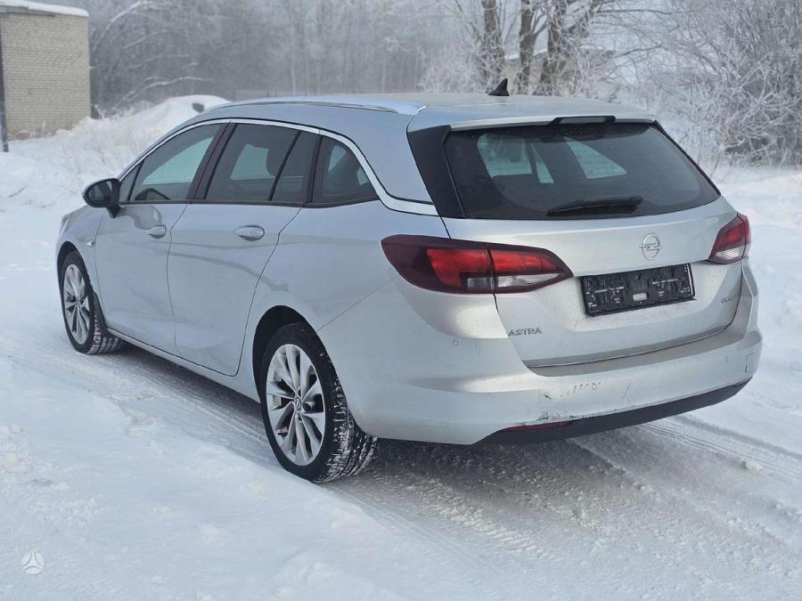 Grey Opel Astra 2016 in Rokiskis, with an engine capacity of 1.60 L and mileage of 145 thousand km for 3850 €, photo 12 on AUTOMOTO.COM.LV