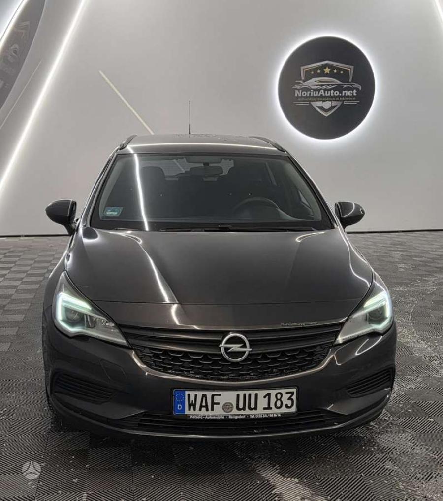 Grey Opel Astra 2016 in Marijampole, with an engine capacity of 1.60 L and mileage of 269 thousand km for 5450 €, photo 17 on AUTOMOTO.COM.LV