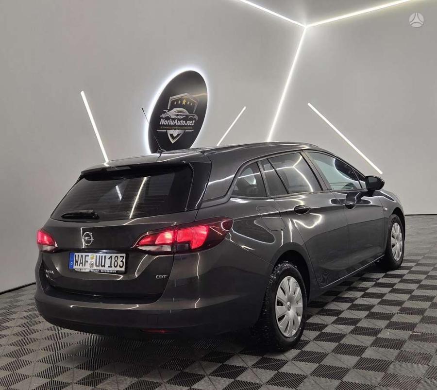 Grey Opel Astra 2016 in Marijampole, with an engine capacity of 1.60 L and mileage of 269 thousand km for 5450 €, photo 20 on AUTOMOTO.COM.LV