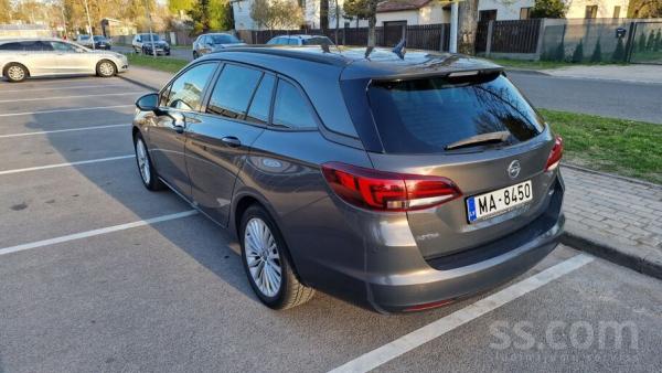 Grey Opel Astra 2016 in Riga, with an engine capacity of 1.60 L and mileage of 220 thousand km for 5450 €, photo 2 on AUTOMOTO.COM.LV