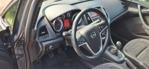 Grey Opel Astra 2016 in Rokiskis, with an engine capacity of 1.36 L and mileage of 137 thousand km for 3900 €, photo 13 on AUTOMOTO.COM.LV