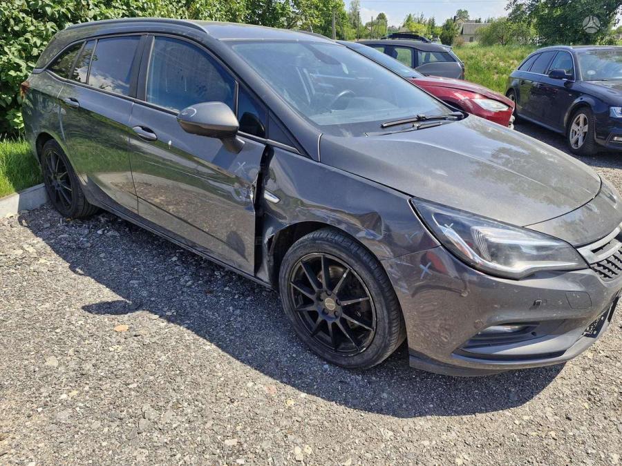 Grey Opel Astra 2016 in Marijampole, with an engine capacity of 1.60 L and mileage of 330 thousand km for 2900 €, photo 7 on AUTOMOTO.COM.LV