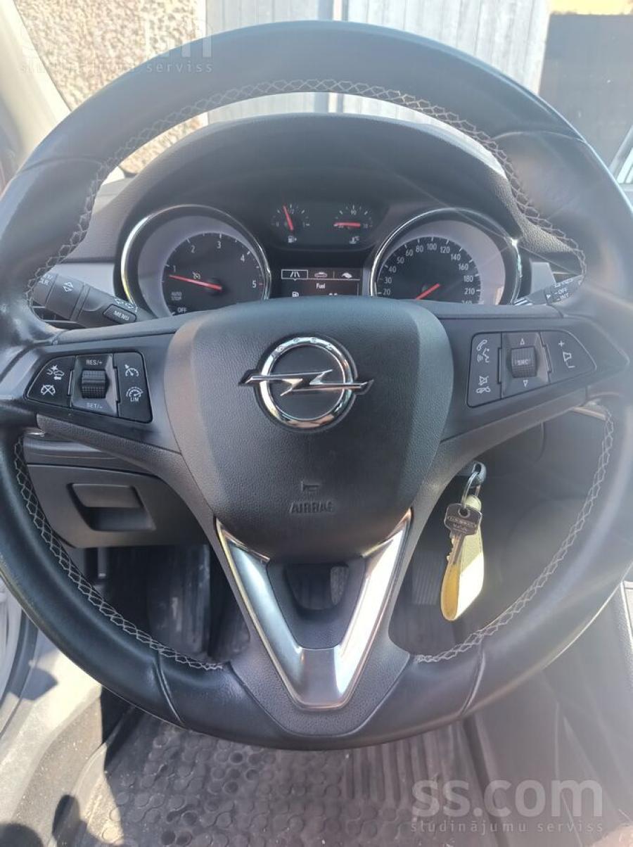 Grey Opel Astra 2016 in Dobele, with an engine capacity of 1.60 L and mileage of 274 thousand km for 6500 €, photo 10 on AUTOMOTO.COM.LV