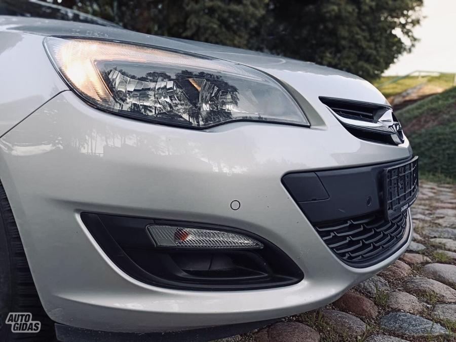Grey Opel Astra 2016 in Utena, with an engine capacity of 1.40 L and mileage of 207 thousand km for 4950 €, photo 12 on AUTOMOTO.COM.LV