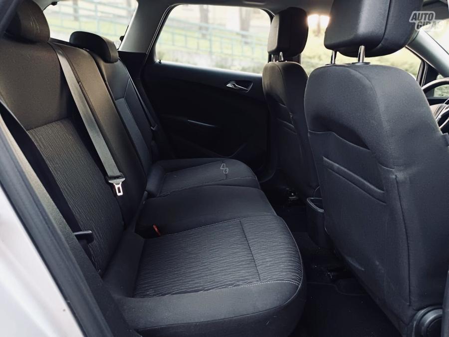Grey Opel Astra 2016 in Utena, with an engine capacity of 1.40 L and mileage of 207 thousand km for 4950 €, photo 32 on AUTOMOTO.COM.LV