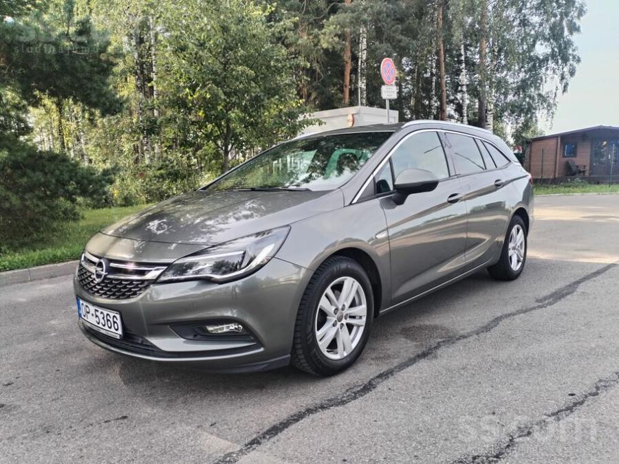 Grey Opel Astra 2016 in Riga, with an engine capacity of 1.60 L and mileage of 128 thousand km for 5250 €, photo 1 on AUTOMOTO.COM.LV