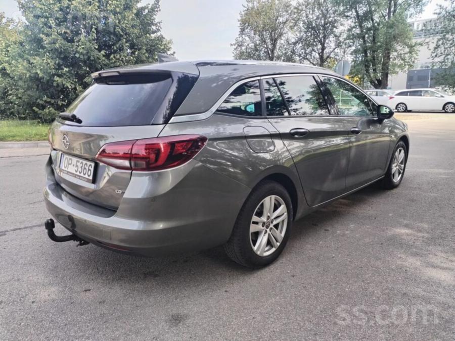 Grey Opel Astra 2016 in Riga, with an engine capacity of 1.60 L and mileage of 128 thousand km for 5250 €, photo 6 on AUTOMOTO.COM.LV